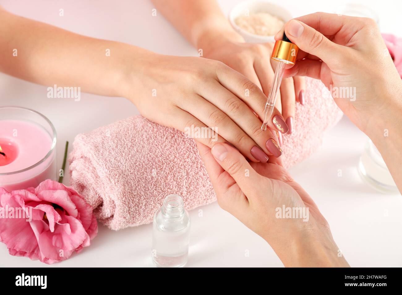 Concept of hand care with cosmetics on white background Stock Photo - Alamy