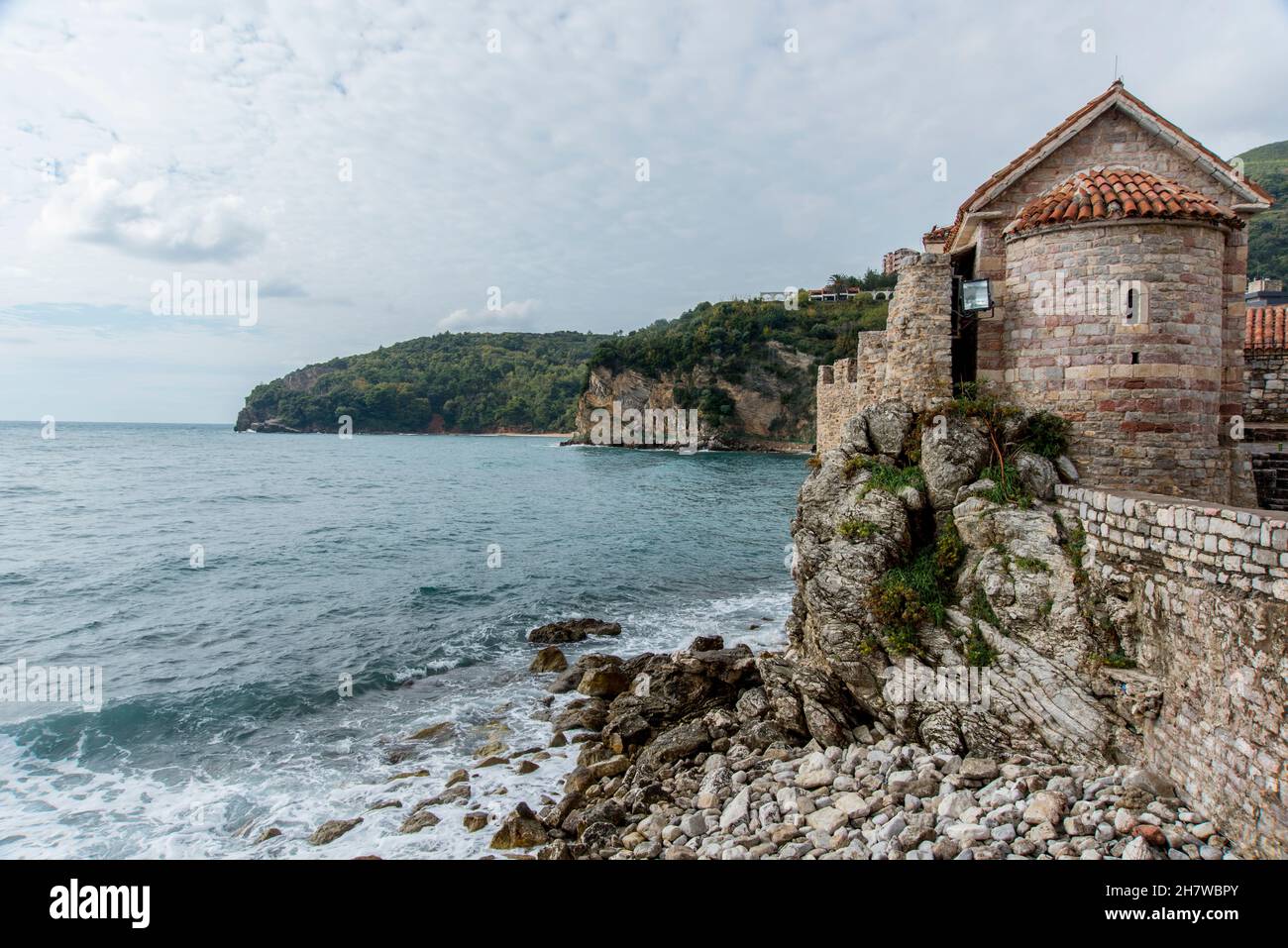 Budva Montenegro ,The old town of Budva and the sculpture of a woman ...