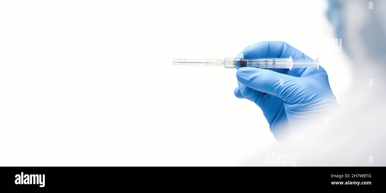 The medical syringe in the hand for prepared injection, horizontal copy ...