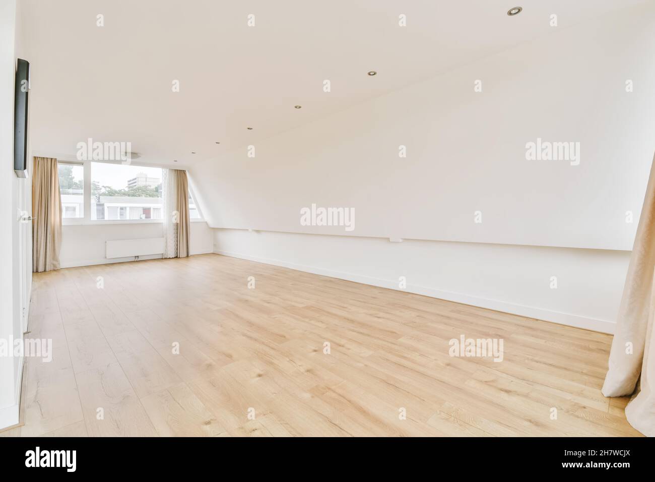 Interior of huge room with large window Stock Photo - Alamy