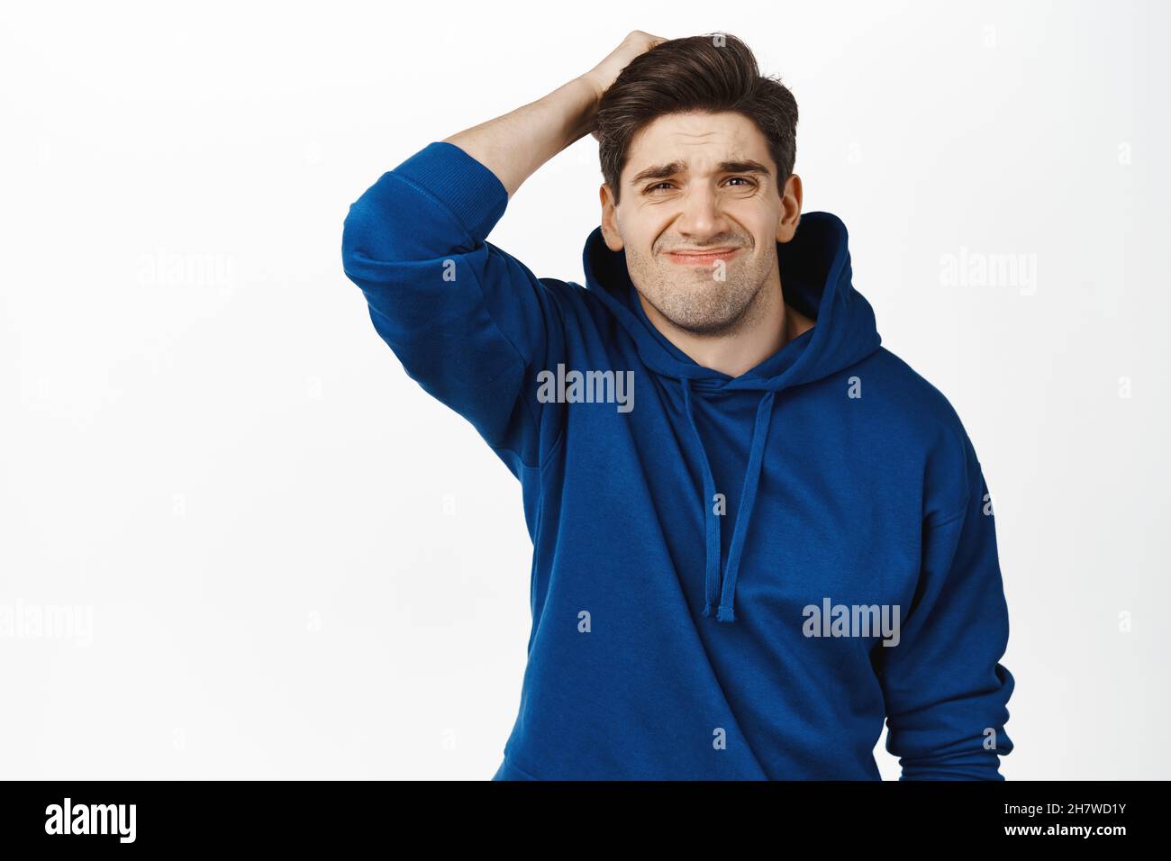 Image of confused guy looking complicated, scratching head and ...