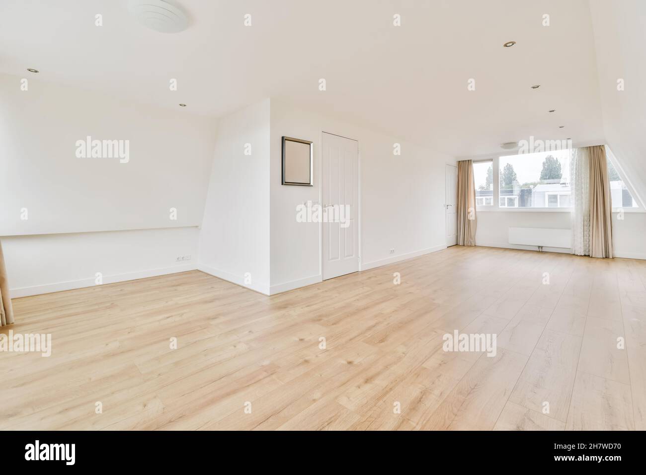 Interior of huge room with large window Stock Photo - Alamy