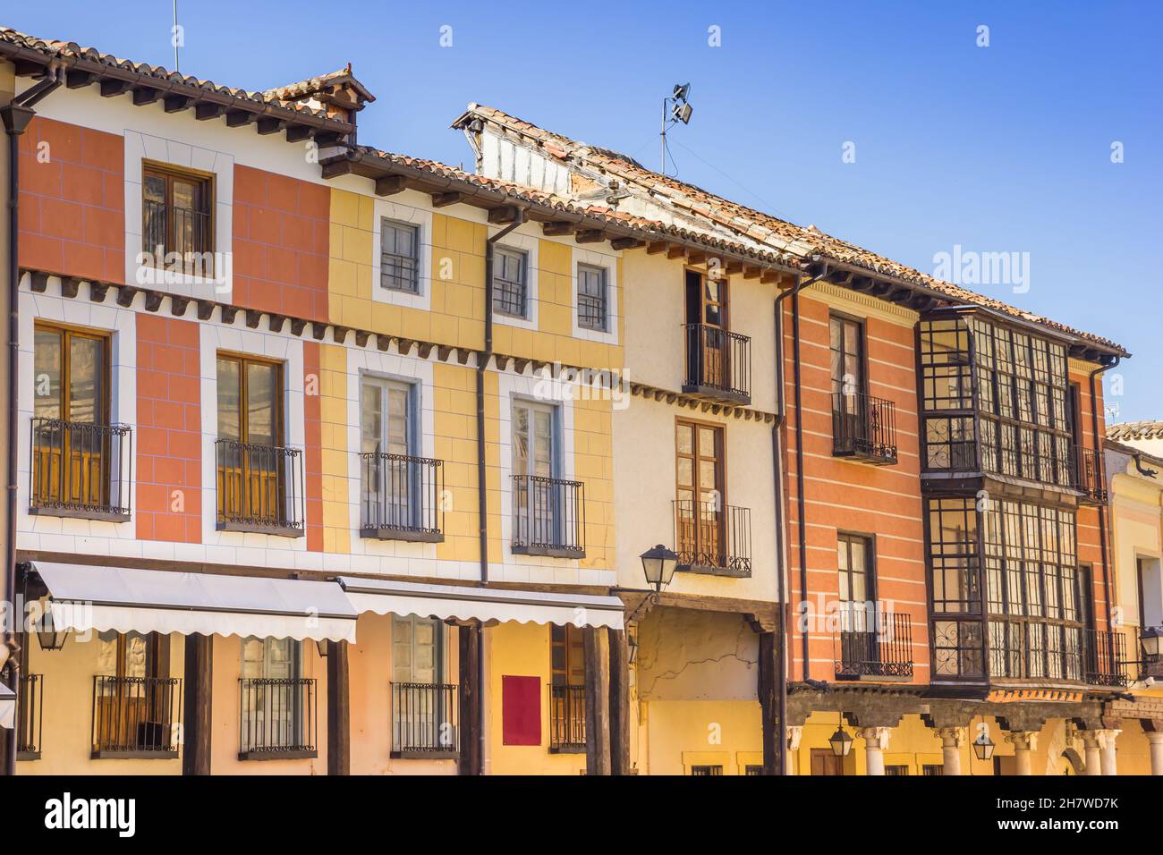 Colorful houses with bay windows on the cathedral square of Burgo de ...