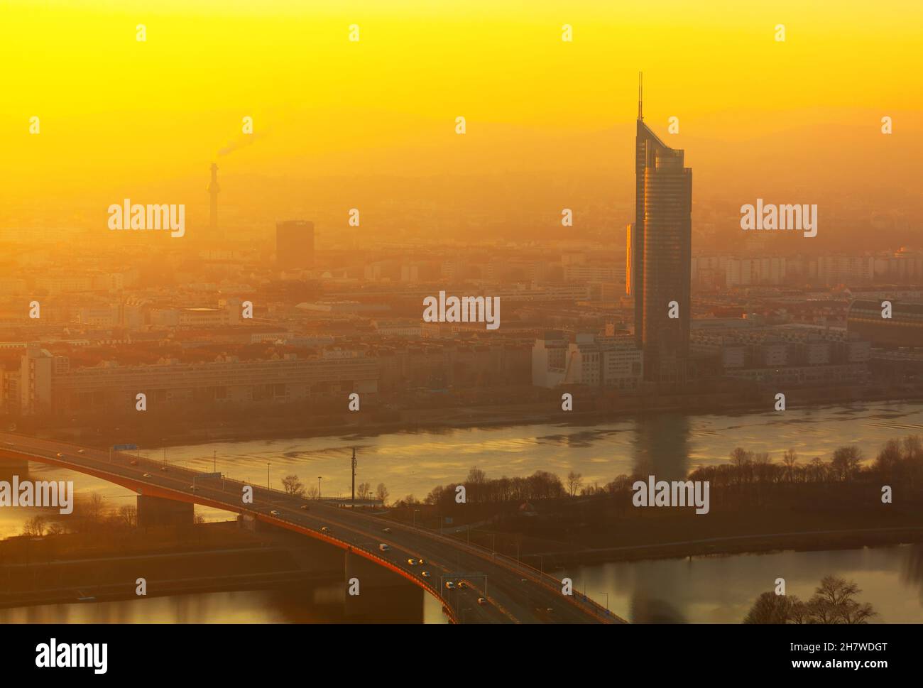 Vienna panorama in the evening . Aerial view of Danube river and bridge ...
