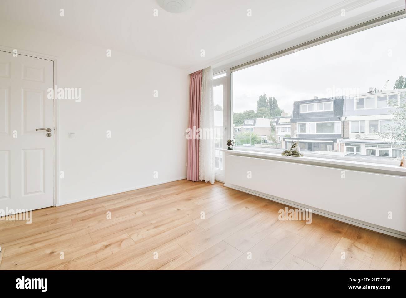 Bright room with large windows with stunning views Stock Photo - Alamy