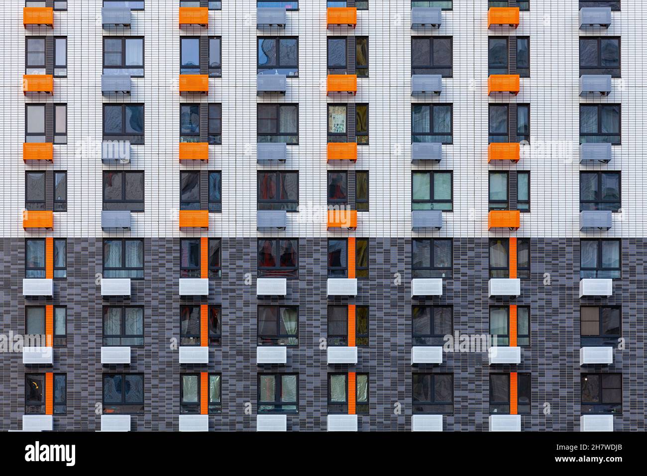 Background image - white and gray wall of a multi-storey building with ...