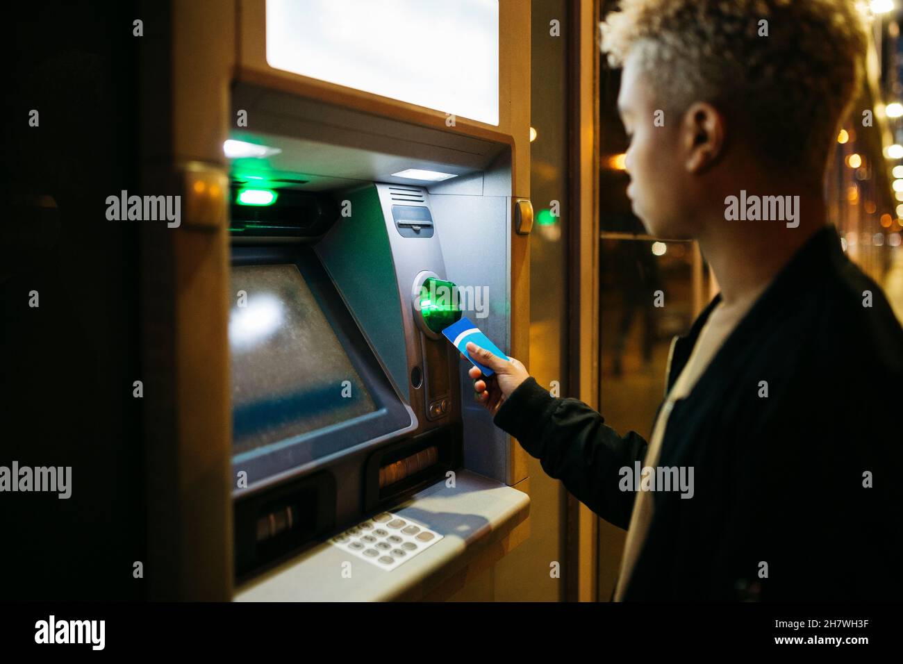 Male cashier hi-res stock photography and images - Alamy