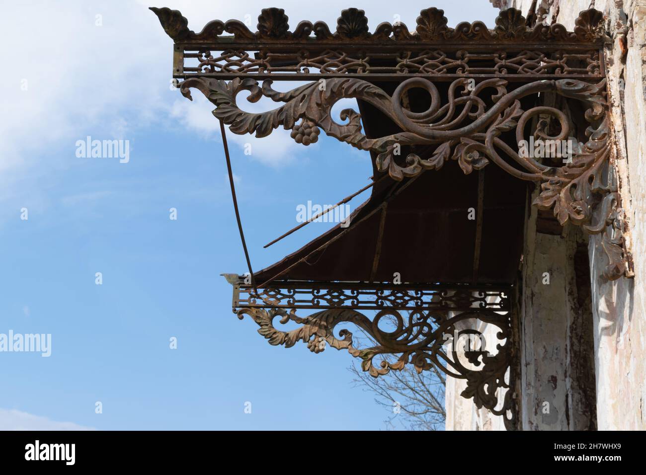 Cast antique metal brackets. Decorative architectural elements. Old ...