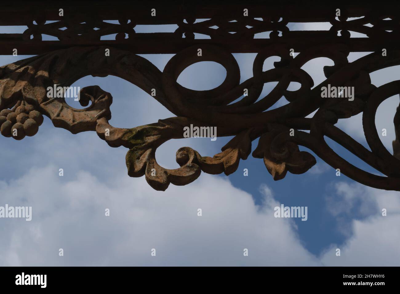 Decorative architectural elements. Antique cast metal brackets. Close ...