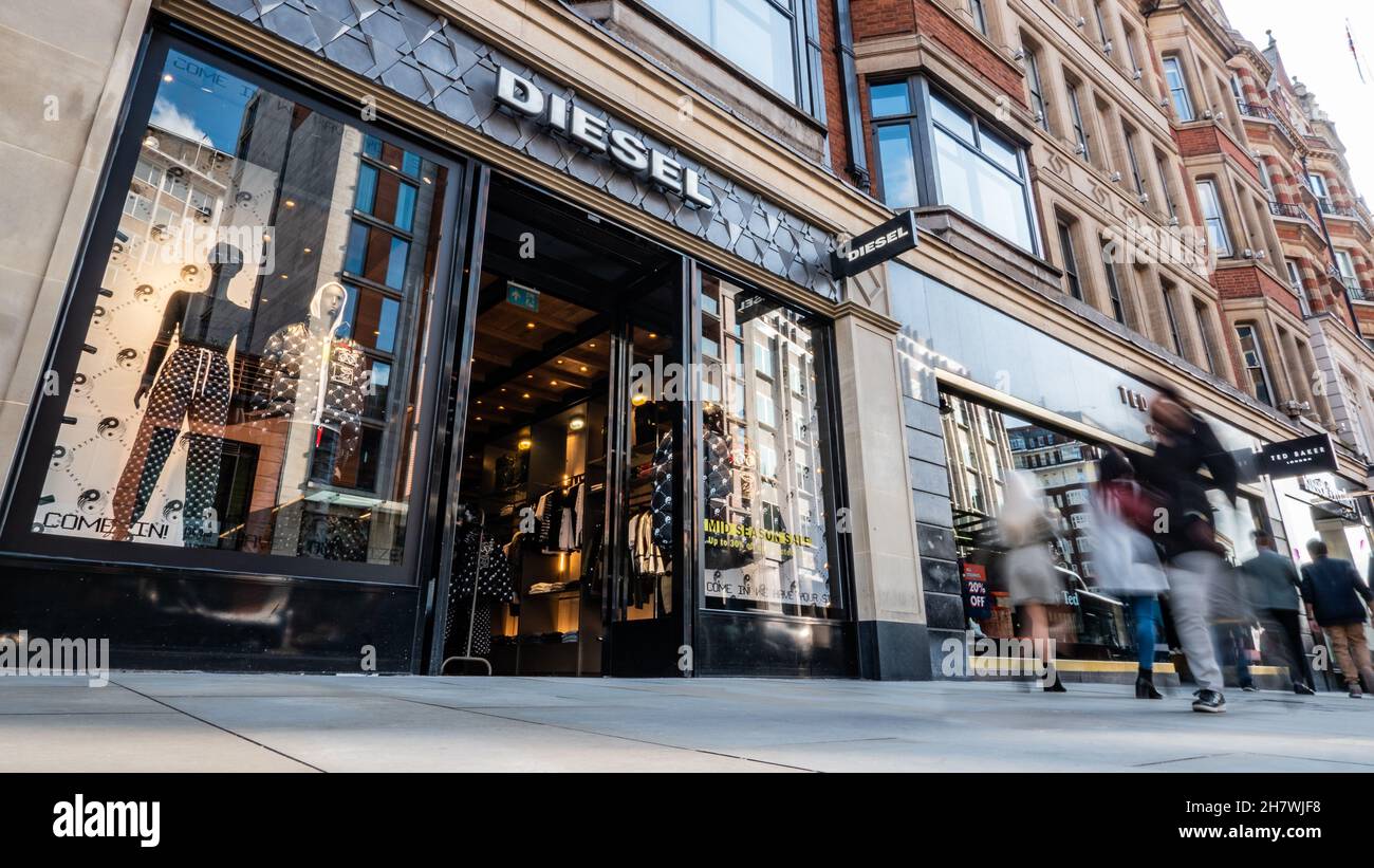 Diesel store, Knightsbridge, London. Shoppers walking by the entrance ...