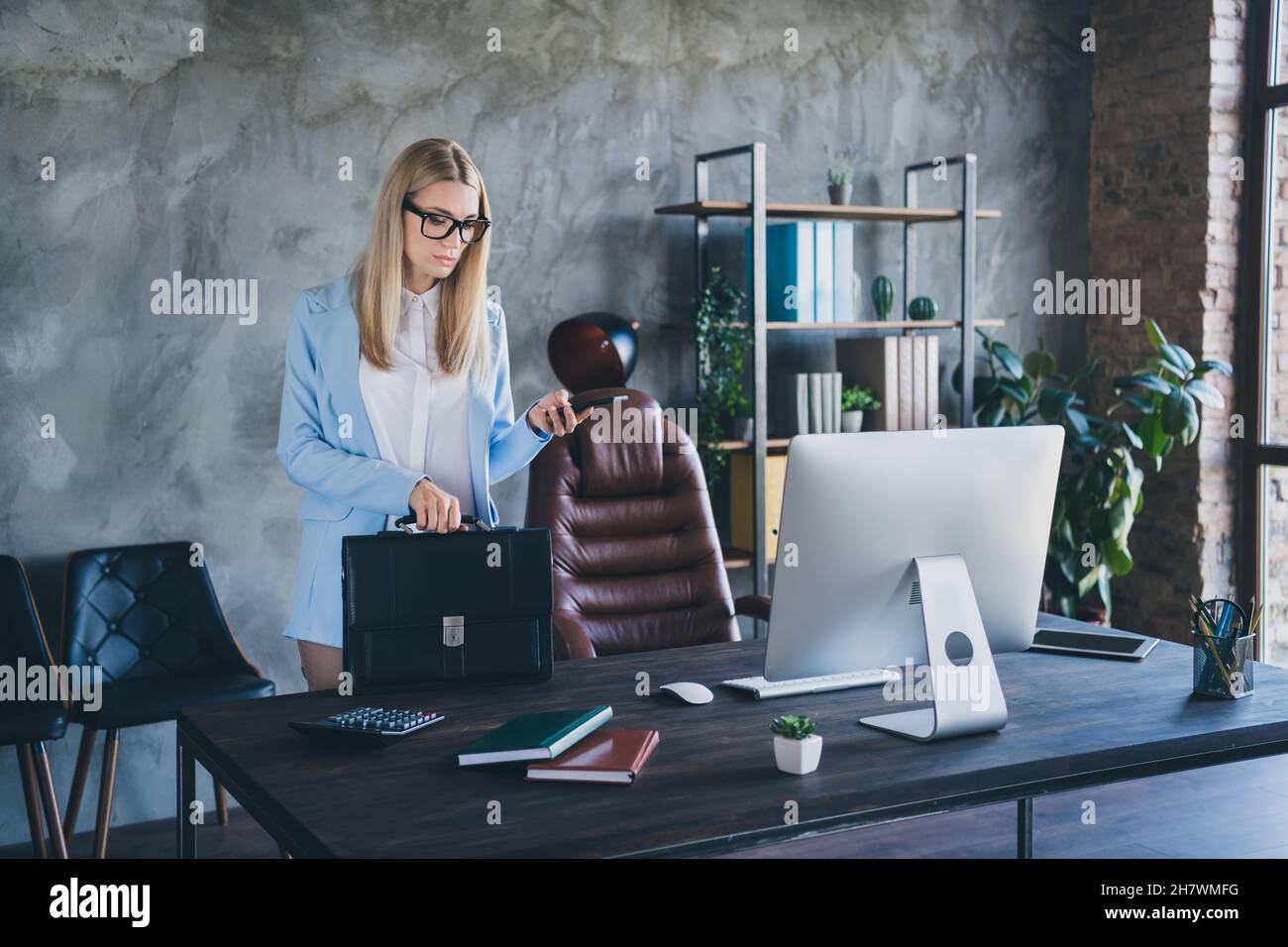 Photo of bossy marketer lawyer lady enter start-up modern office put ...