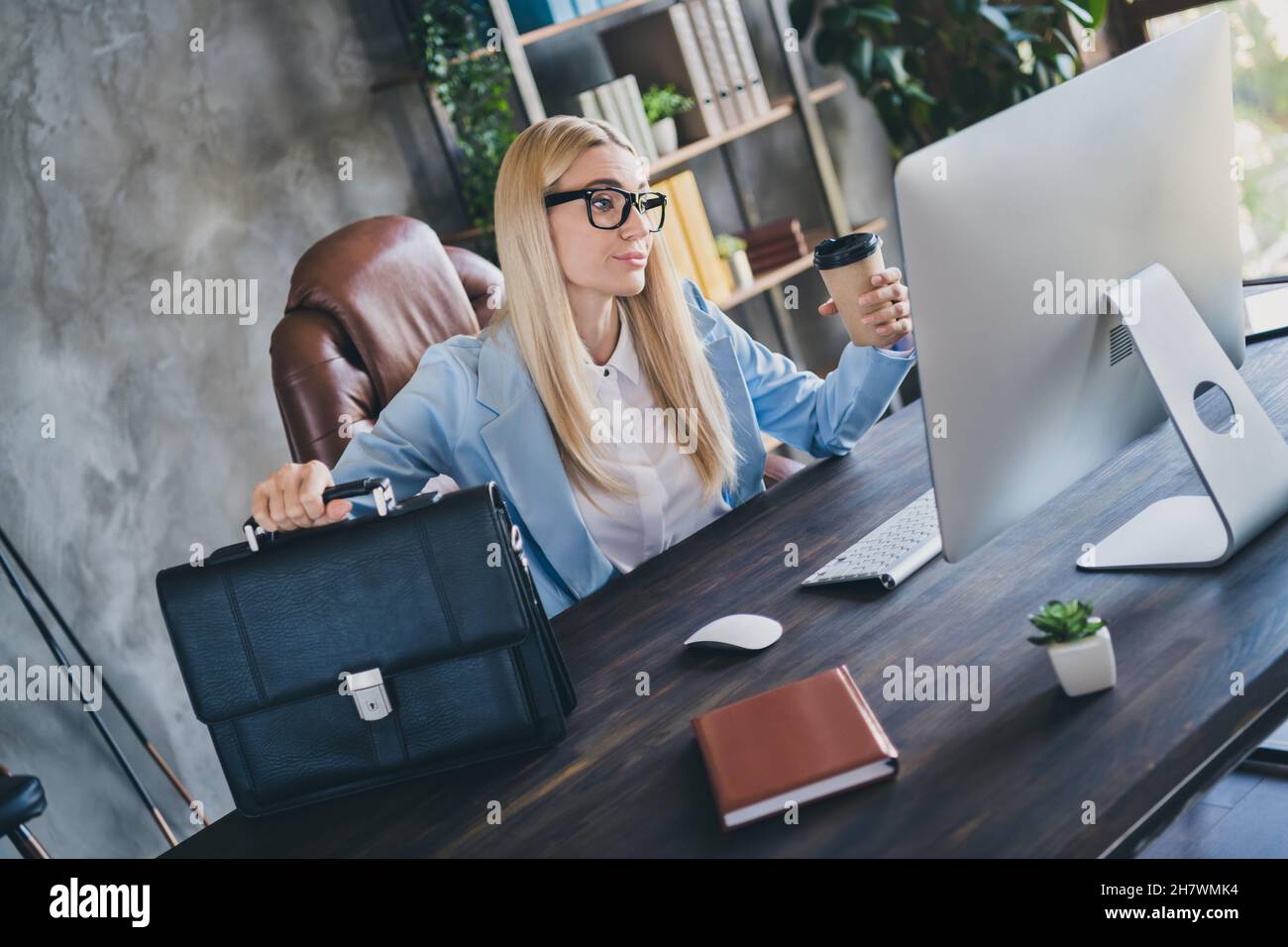 Photo of busy experienced specialist lady sit desk morning look pc ...