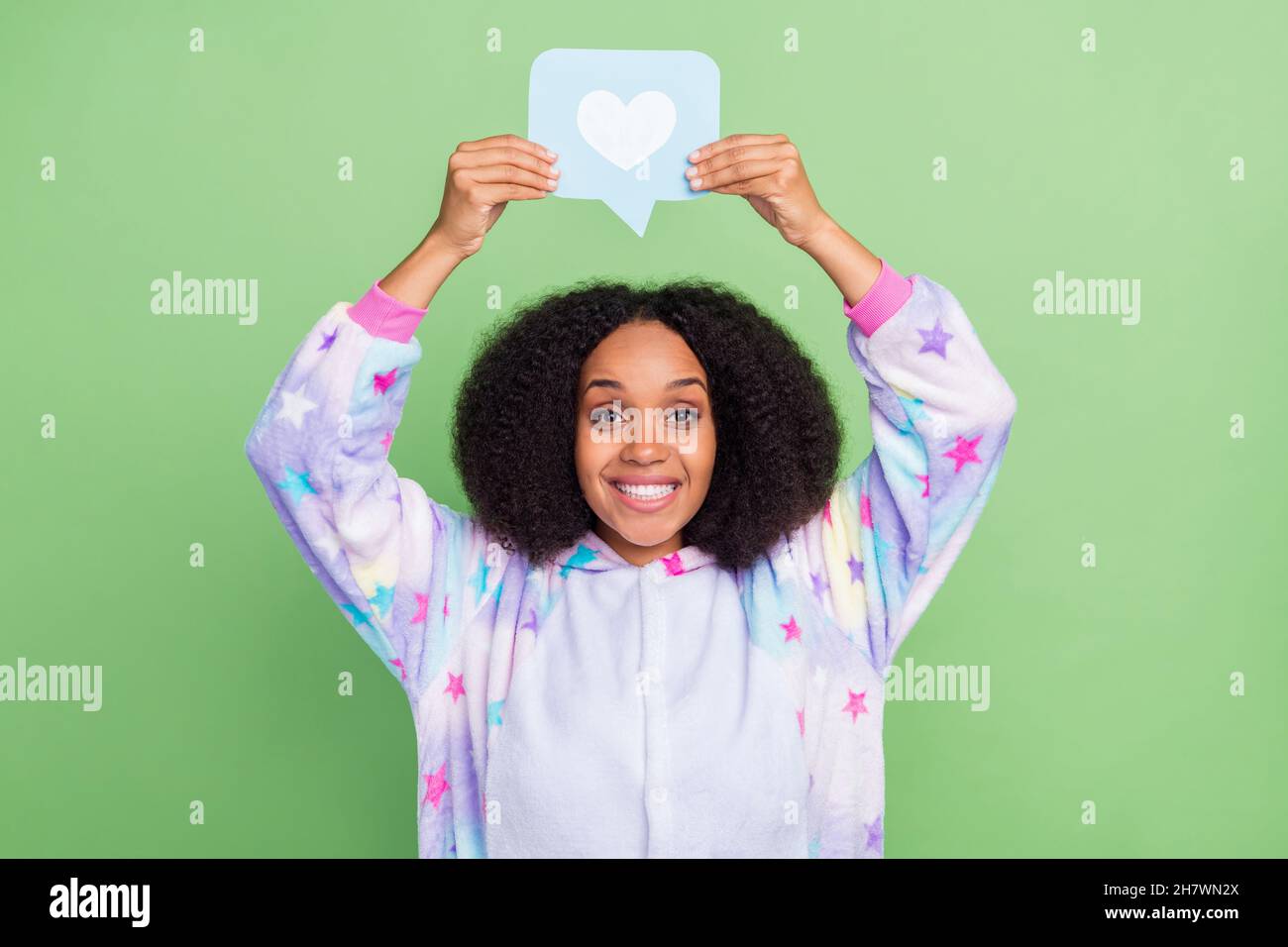 Photo of positive lady raise paper heart up show social media followers ...