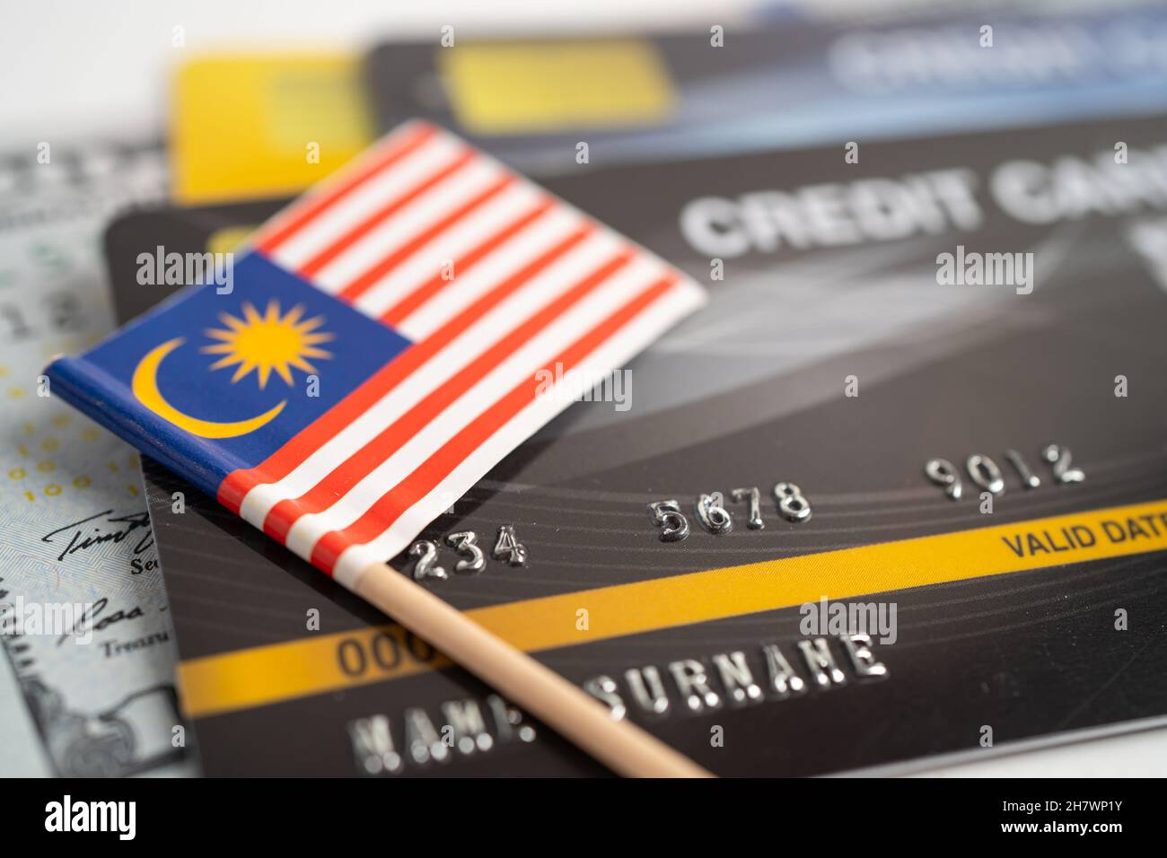 Malaysia flag on credit card. Finance development, Banking Account ...