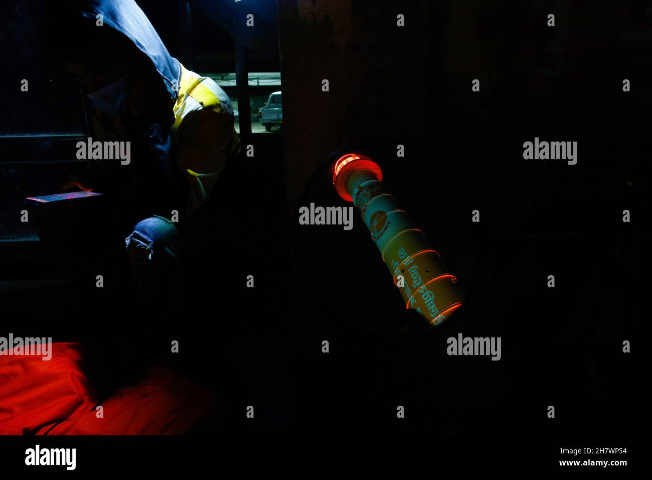 Kathmandu, Nepal. 25th Nov, 2021. Red lights illuminate the Dharahara ...