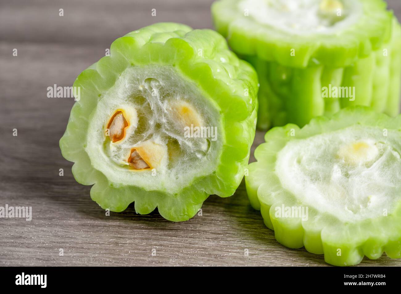Chinese gourd vegetable for cooking healthy food on wooden background ...