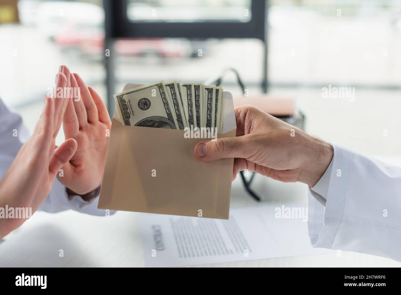 Doctor money envelope hi-res stock photography and images - Alamy