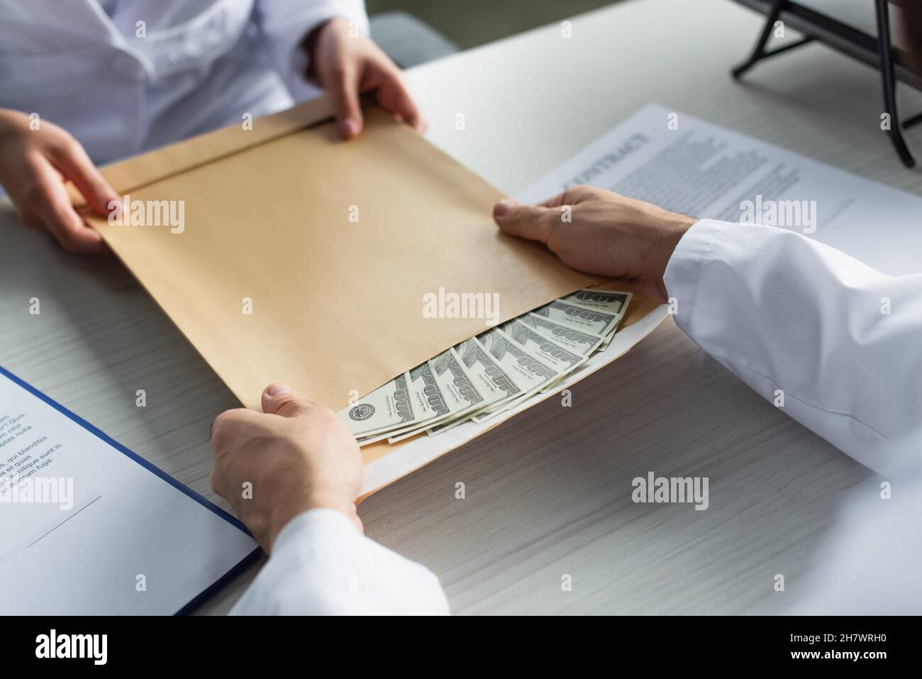 Doctor money envelope hi-res stock photography and images - Alamy