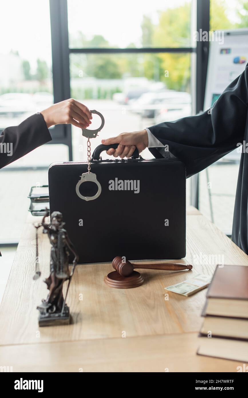 Woman with handcuffs hi-res stock photography and images - Alamy