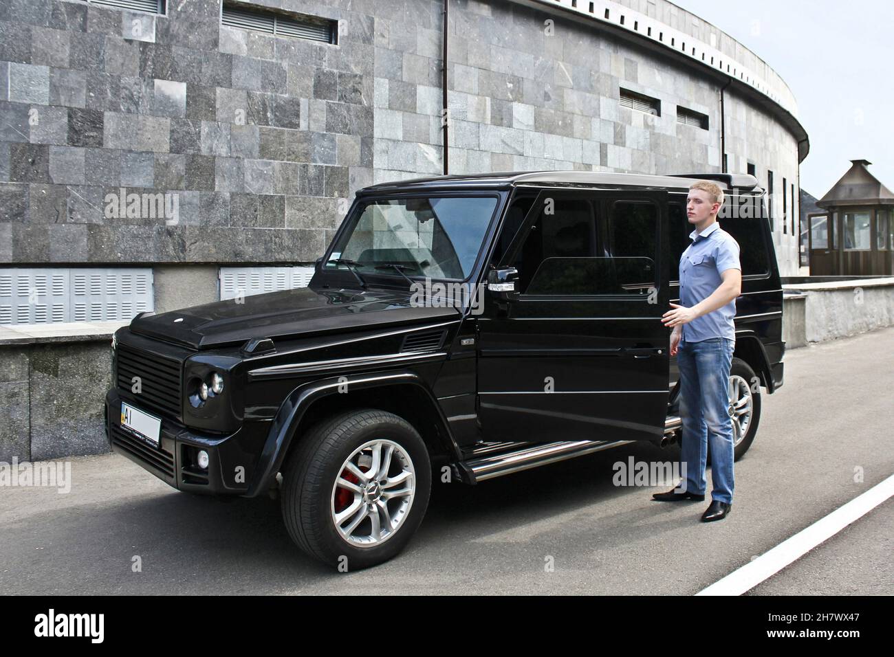 Kiev, Ukraine - May 12, 2013: Man near Mercedes-Benz G500 Stock Photo ...