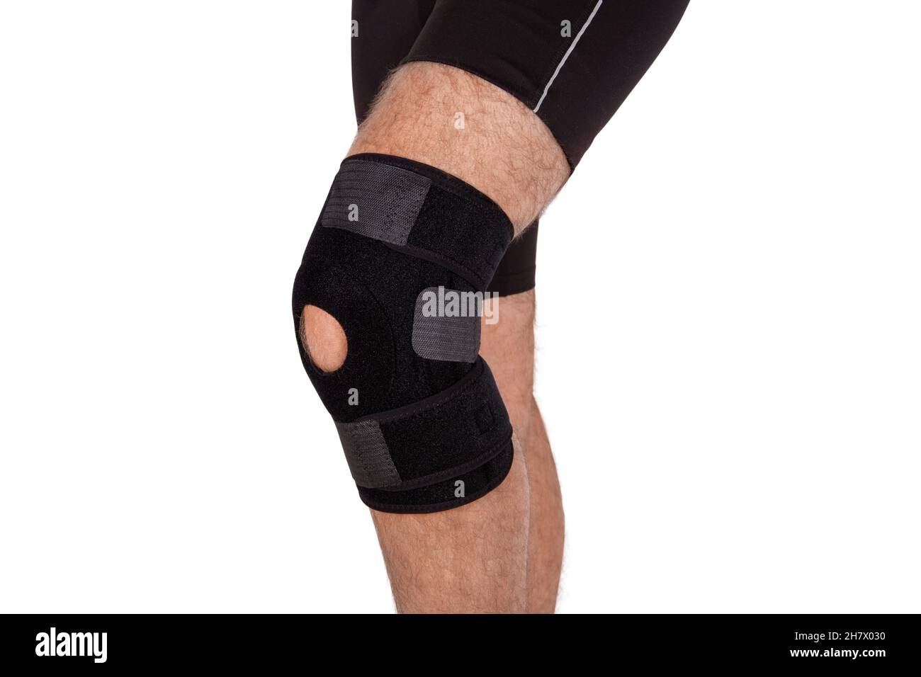 Knee Support Brace on leg isolated on white background. Orthopedic ...
