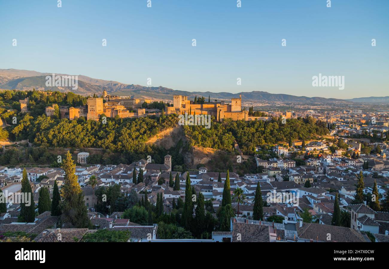 View of Alhambra Palace in Granada, Spain, with Sierra Nevada mountains ...