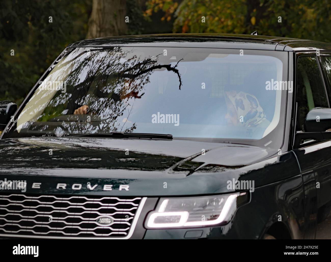 Queen Elizabeth II, is seen at lunchtime today, being driven around the ...