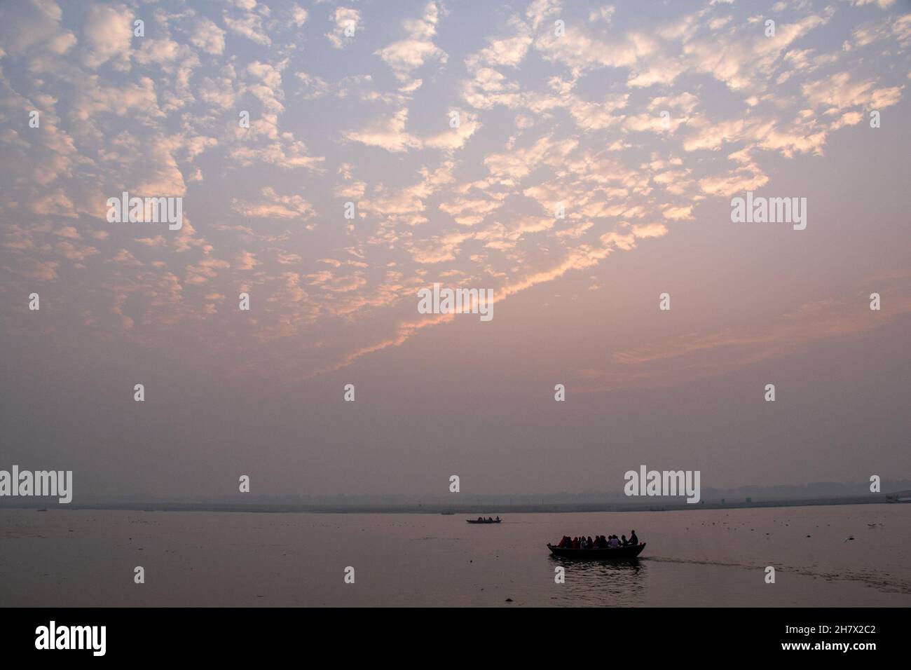 Benares ganga river morning sun hi-res stock photography and images - Alamy