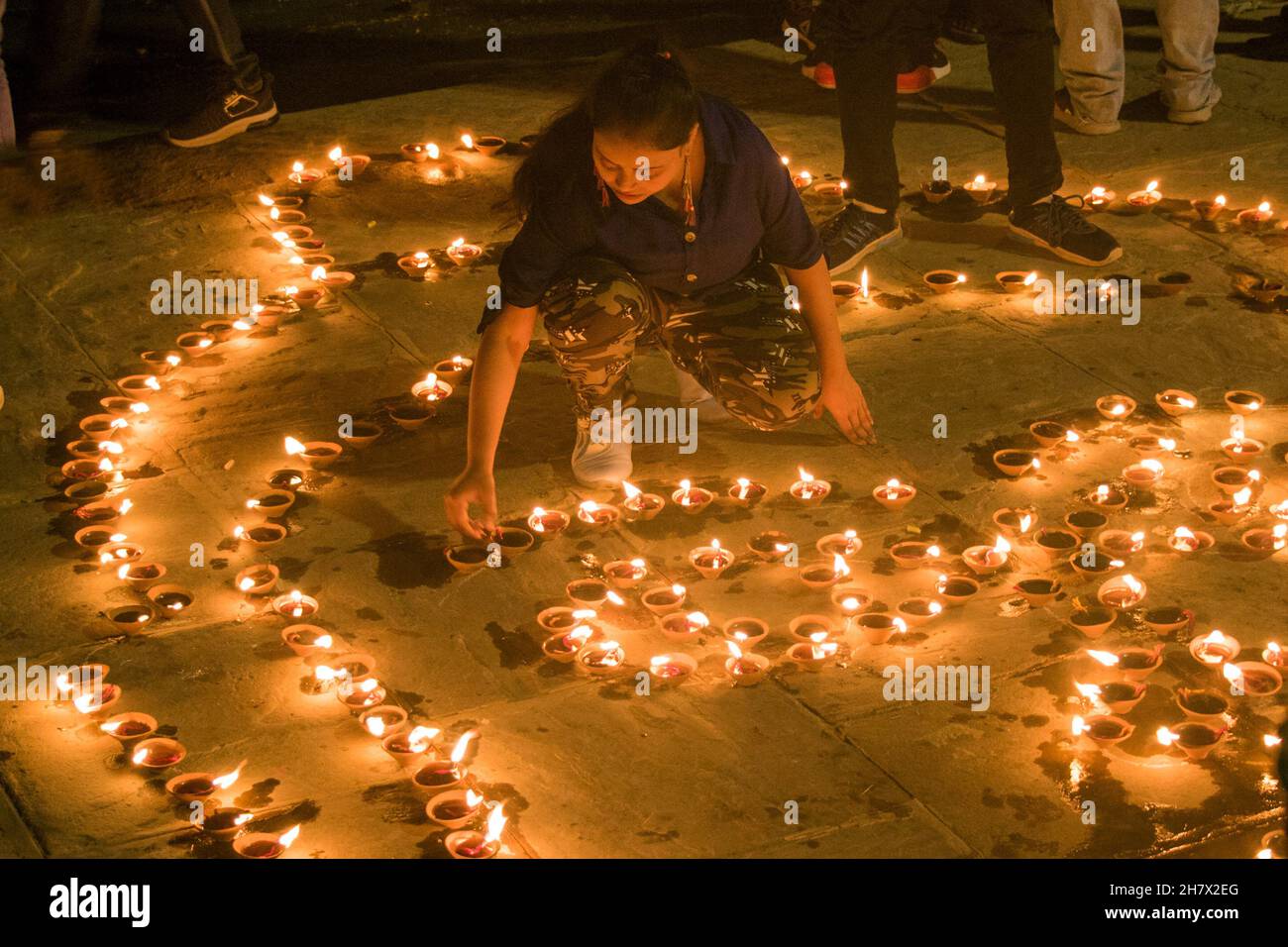 Ghats of Varanasi decorated and light up with small earthen lamps ...