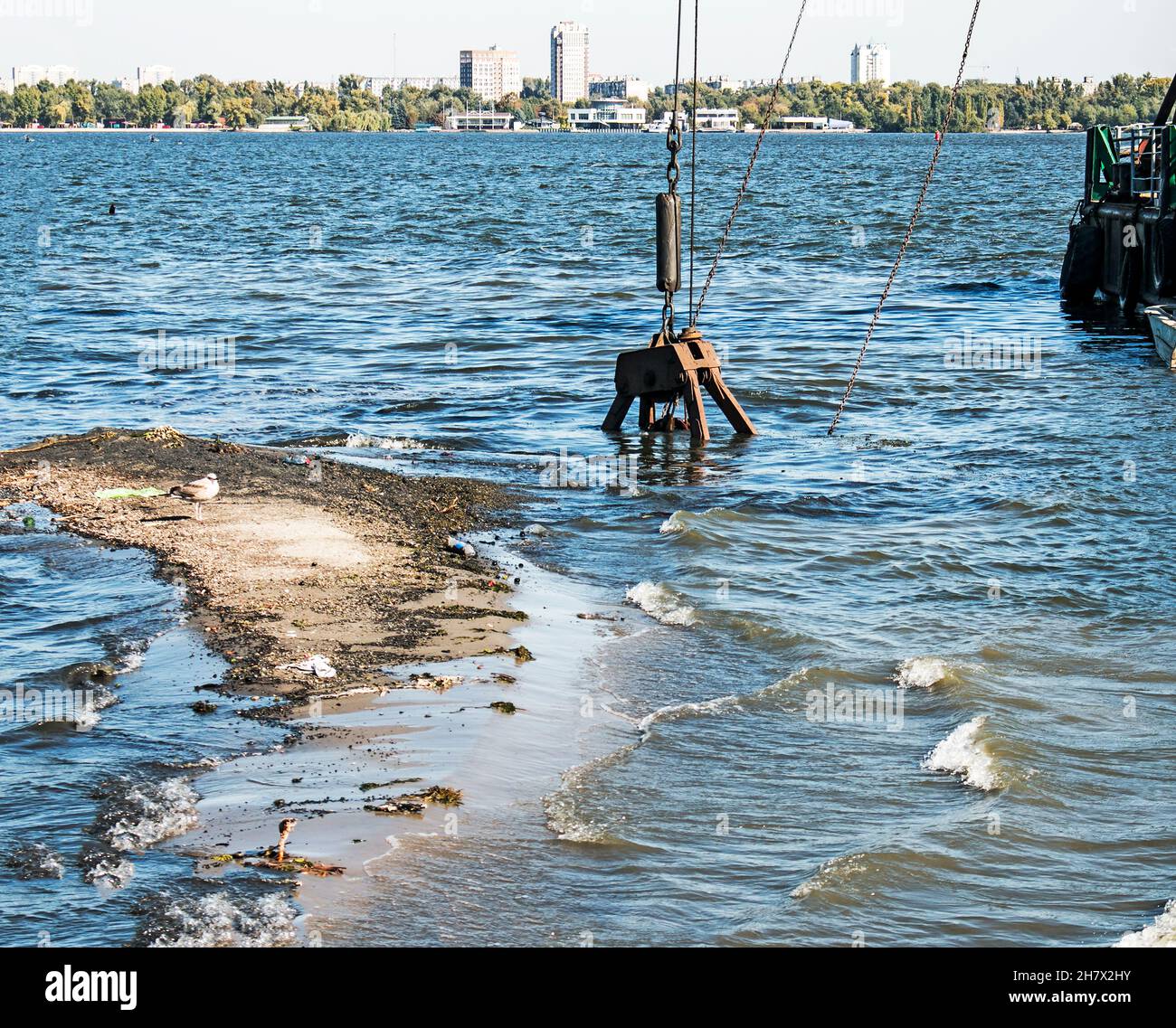 Cleaning the newly formed island from industrial waste on the Dnieper ...