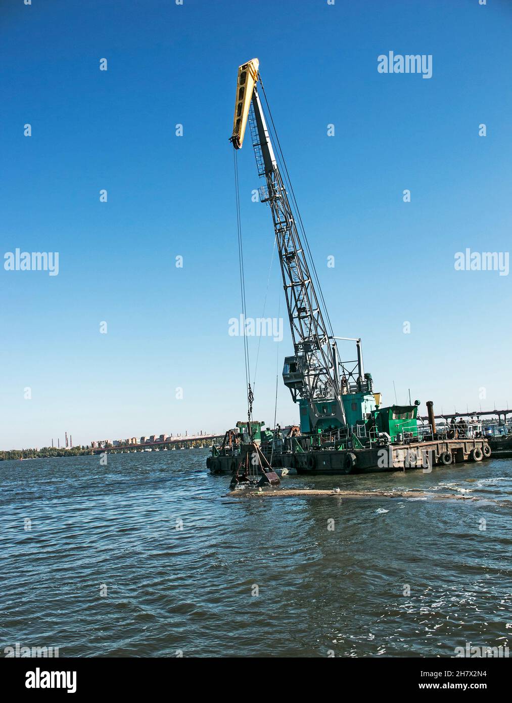 Cleaning the newly formed island from industrial waste on the Dnieper ...