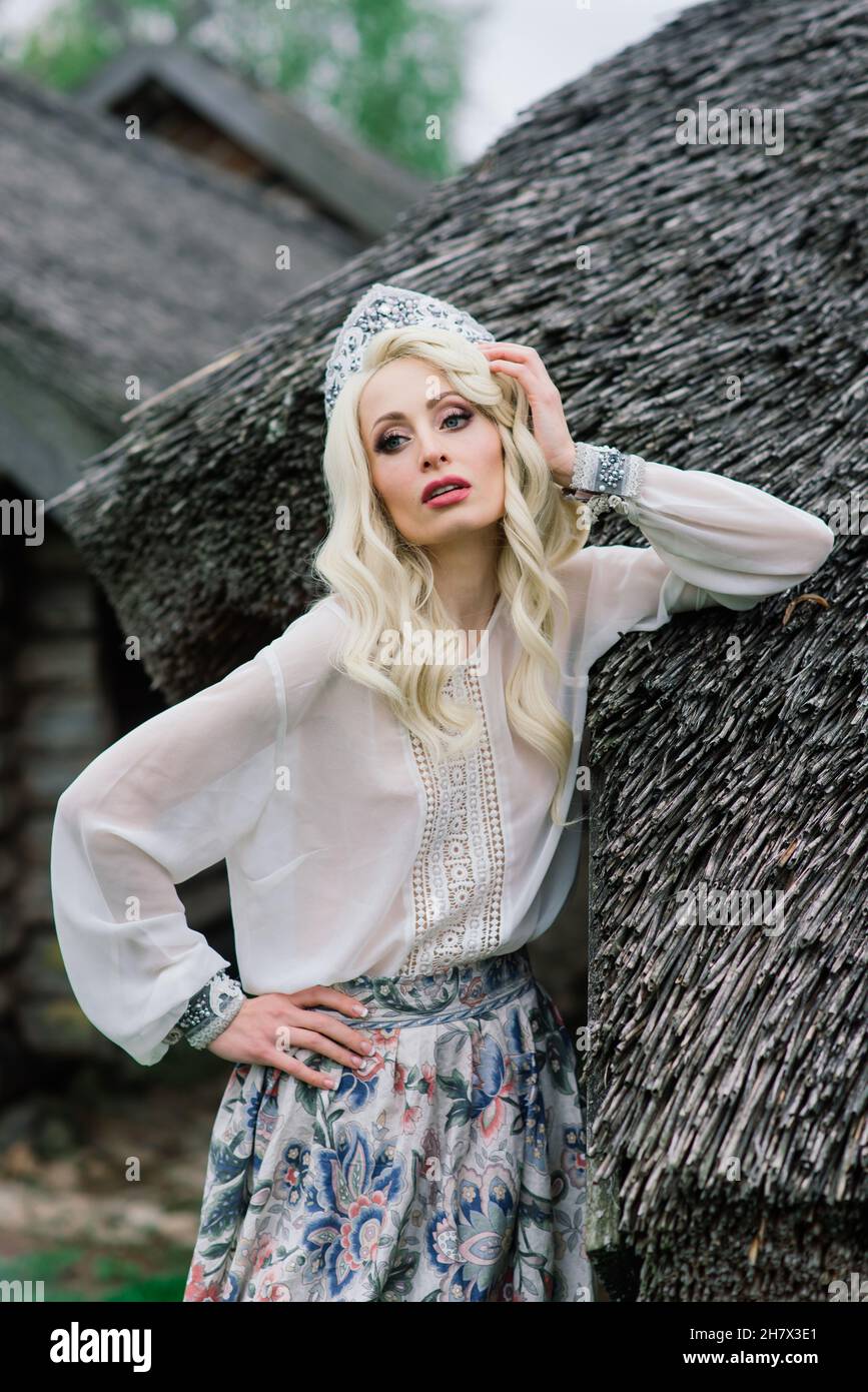 Young female of Slavic appearance with crown, kokoshnik on the ...