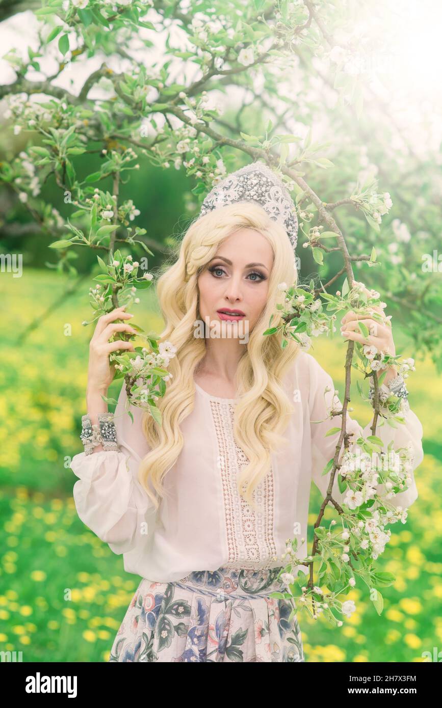 Stylish russian female in traditional national folk dress sundress and ...