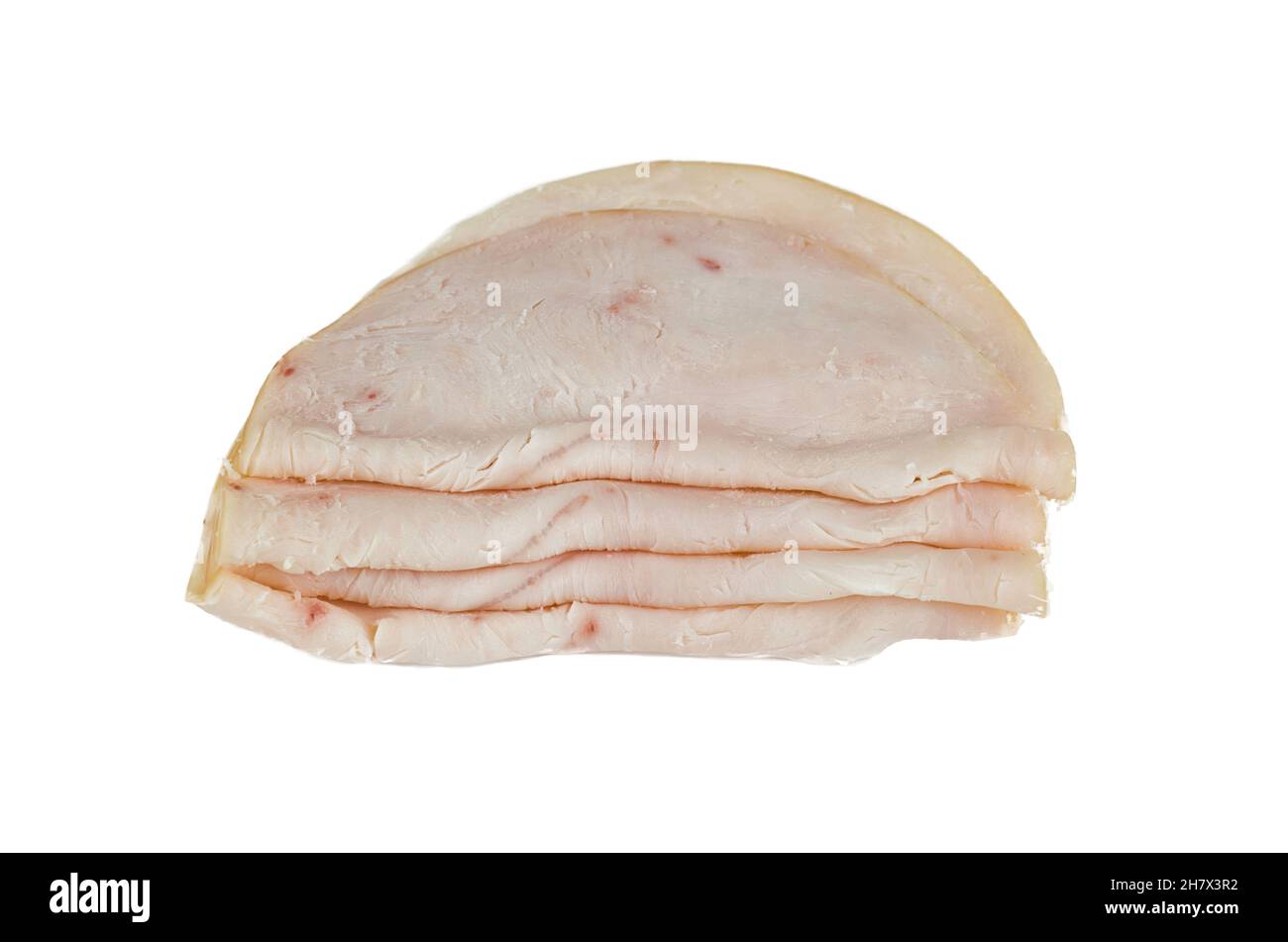 A stack of slices of turkey ham isolated on white. Top view Stock Photo ...
