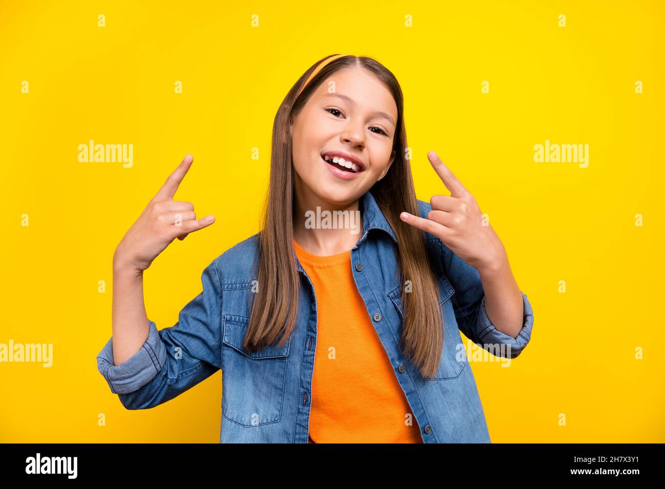Photo of cool funky student girl wear denim shirt smiling showing hard ...