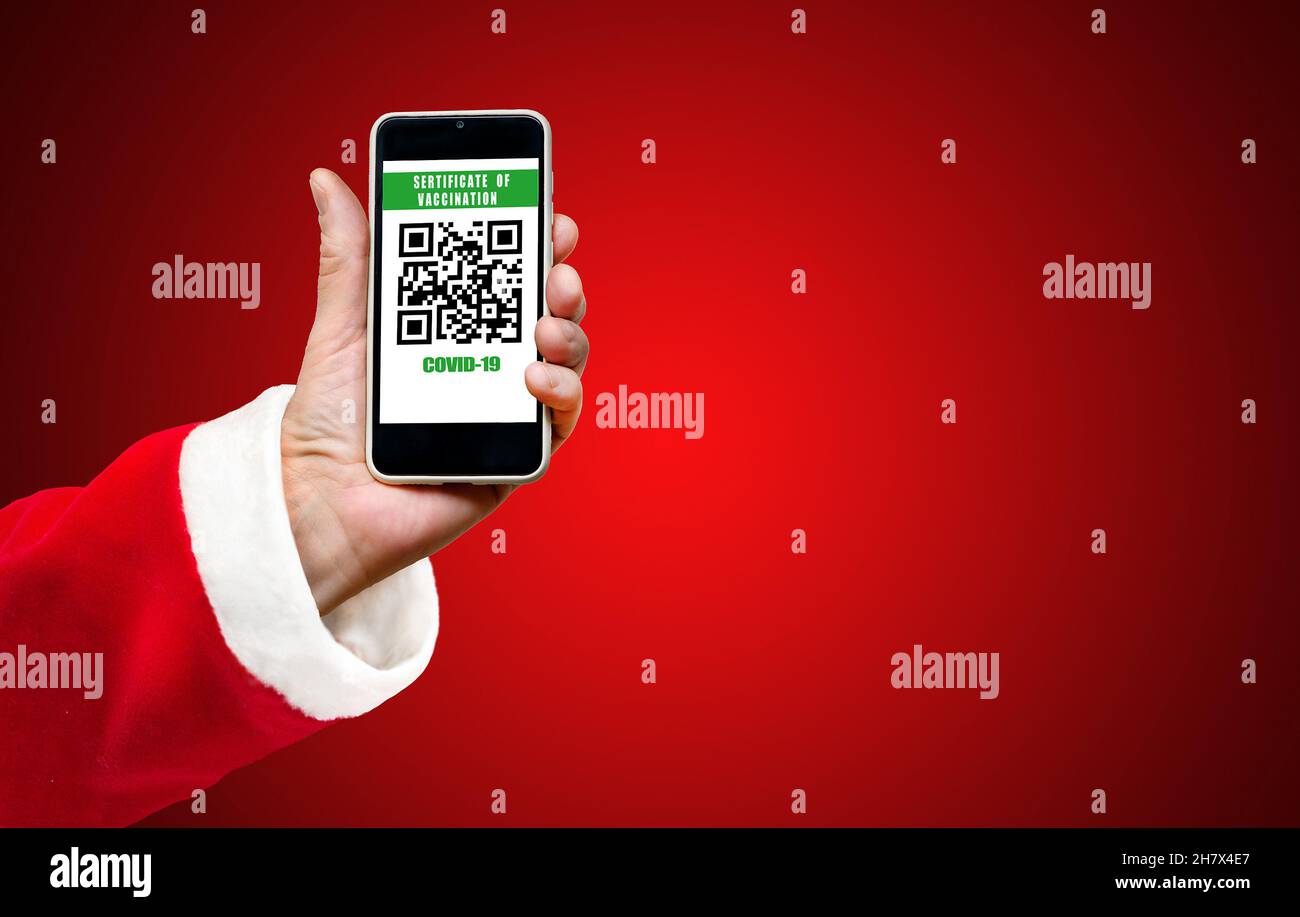 Santa Claus show QR code on smartphone vaccinated COVID-19 or ...