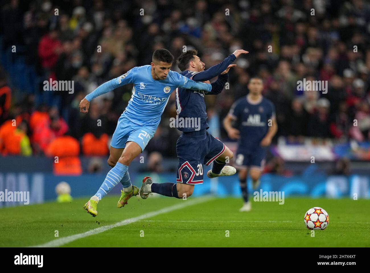 Manchester, UK. 24th Nov, 2021. Joao Cancelo of Man City fouls Lionel ...