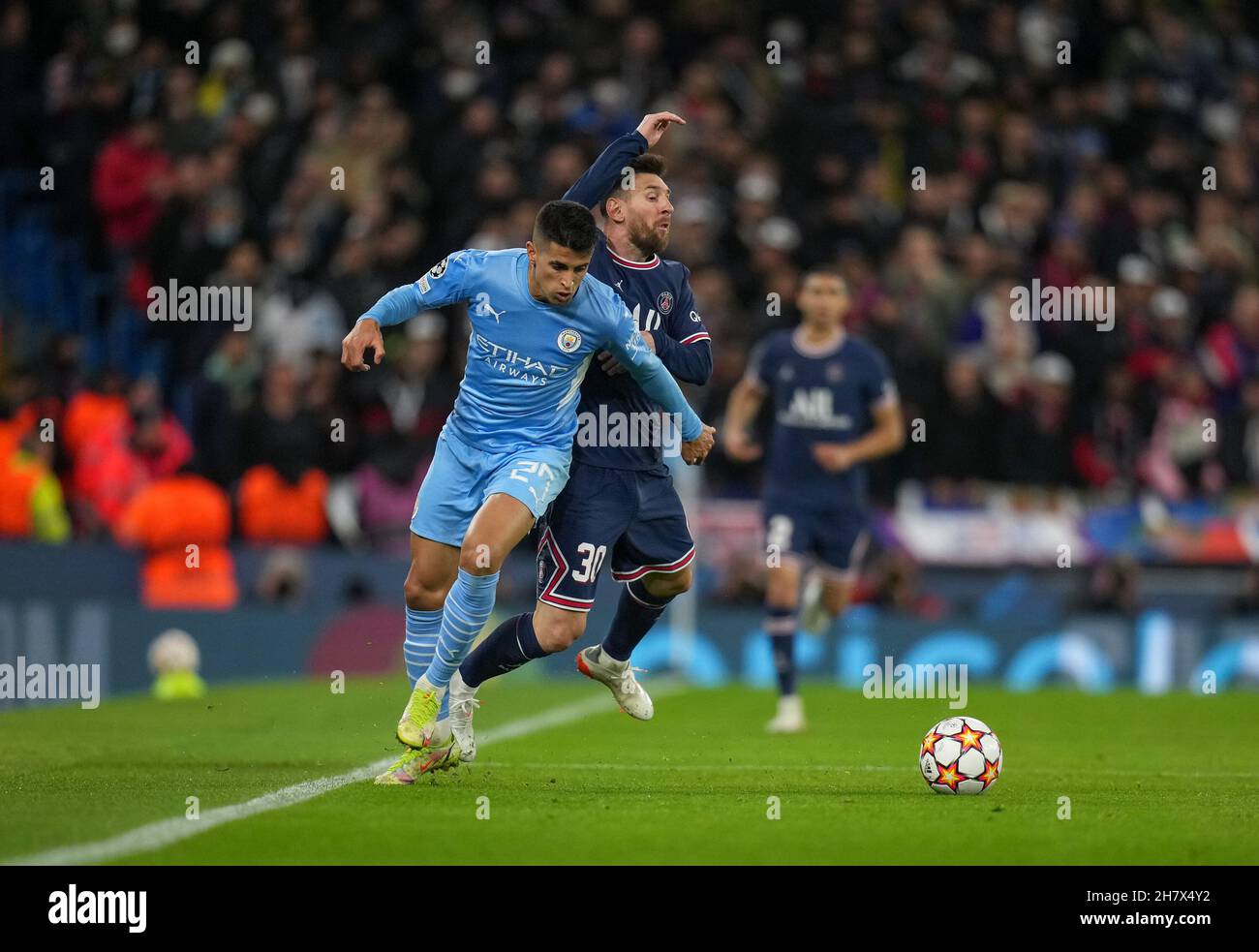 Manchester, UK. 24th Nov, 2021. Joao Cancelo of Man City fouls Lionel ...