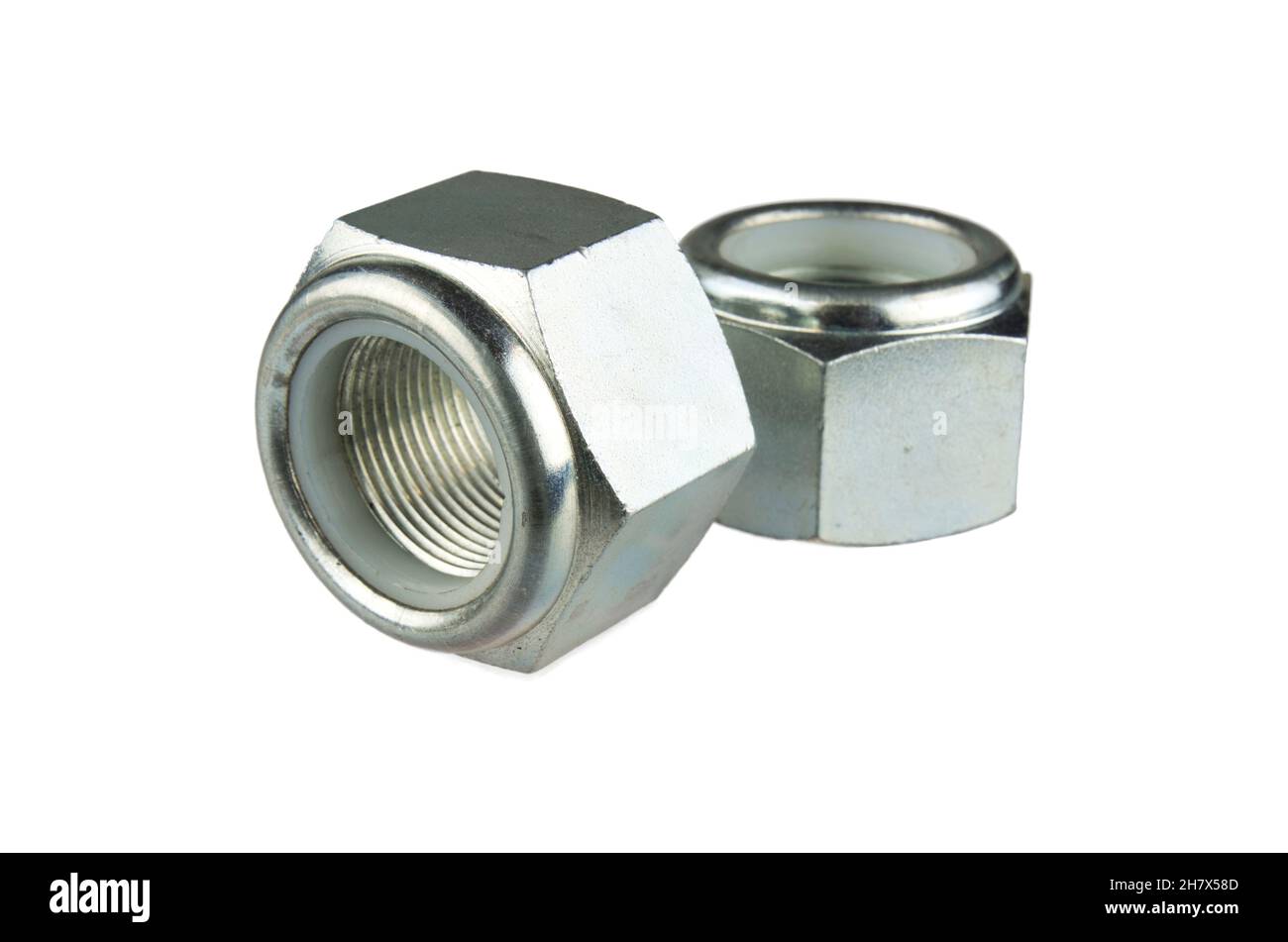 Metal nut isolated on white background, female screw Stock Photo - Alamy