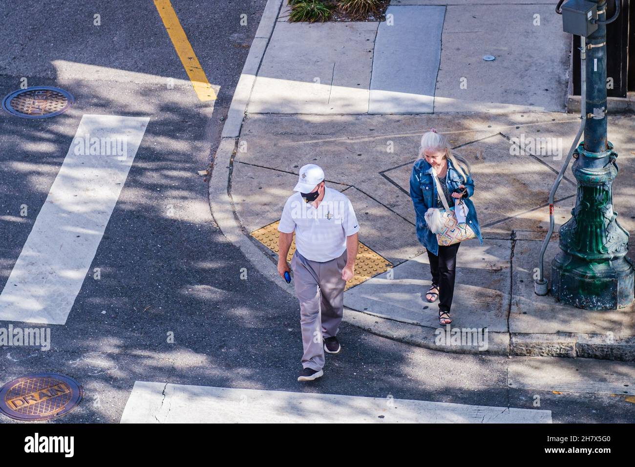 NEW ORLEANS, LA - NOVEMBER 21, 2020: Man and woman step into the ...
