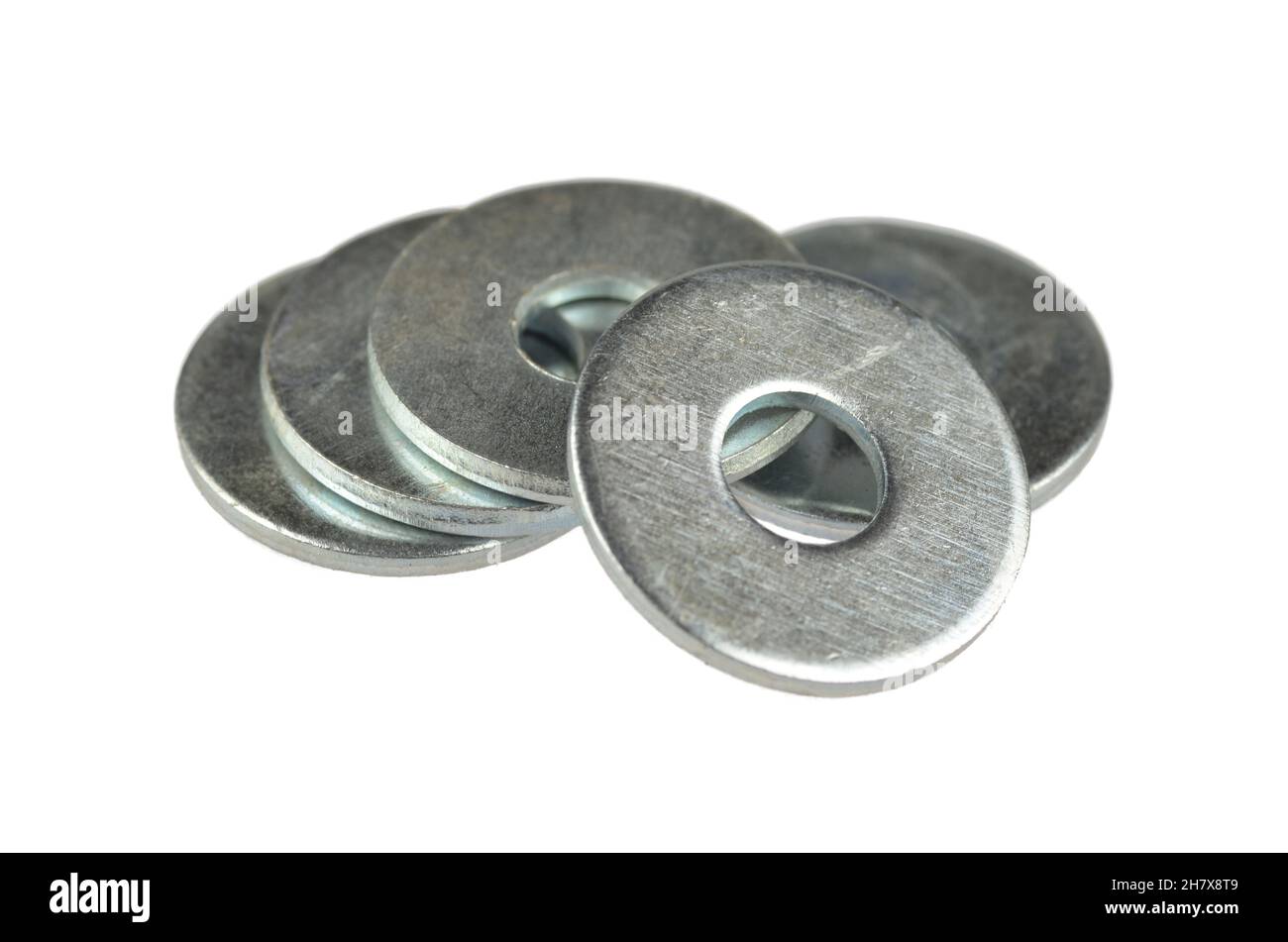 Steel washers, isolated on a white background Stock Photo - Alamy
