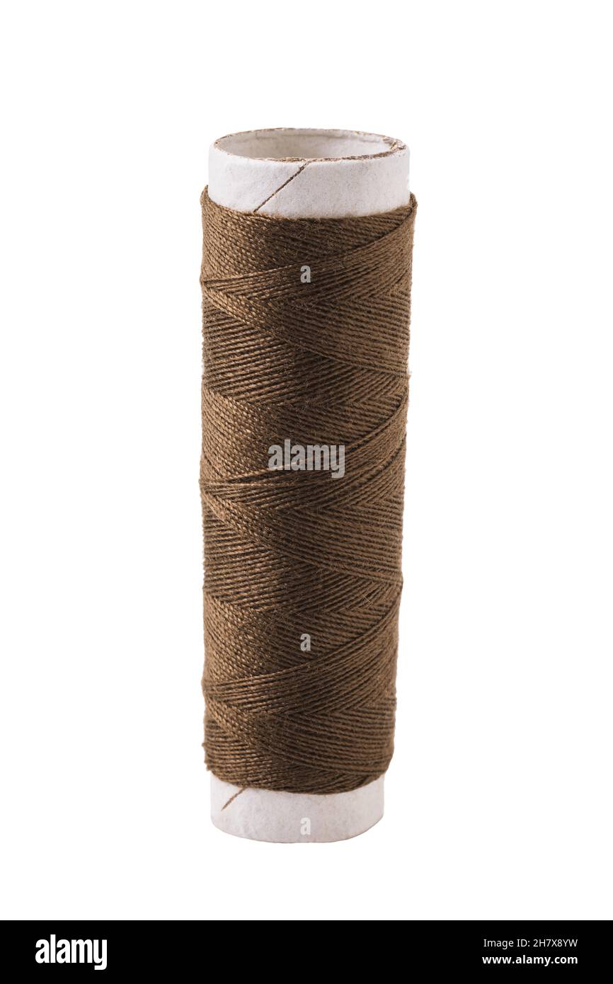 Spool of thread in brown color isolated on white background Stock Photo ...