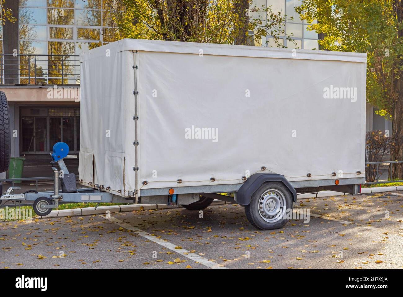 Single Axle Trailer With White Canvas Box Cover Stock Photo - Alamy
