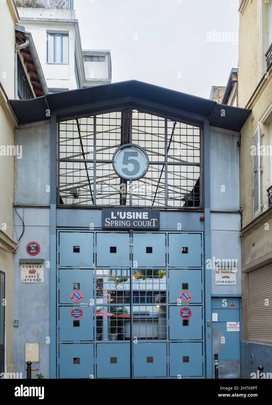 Paris, France - November 14th 2021: Historic entrance gate to a factory ...