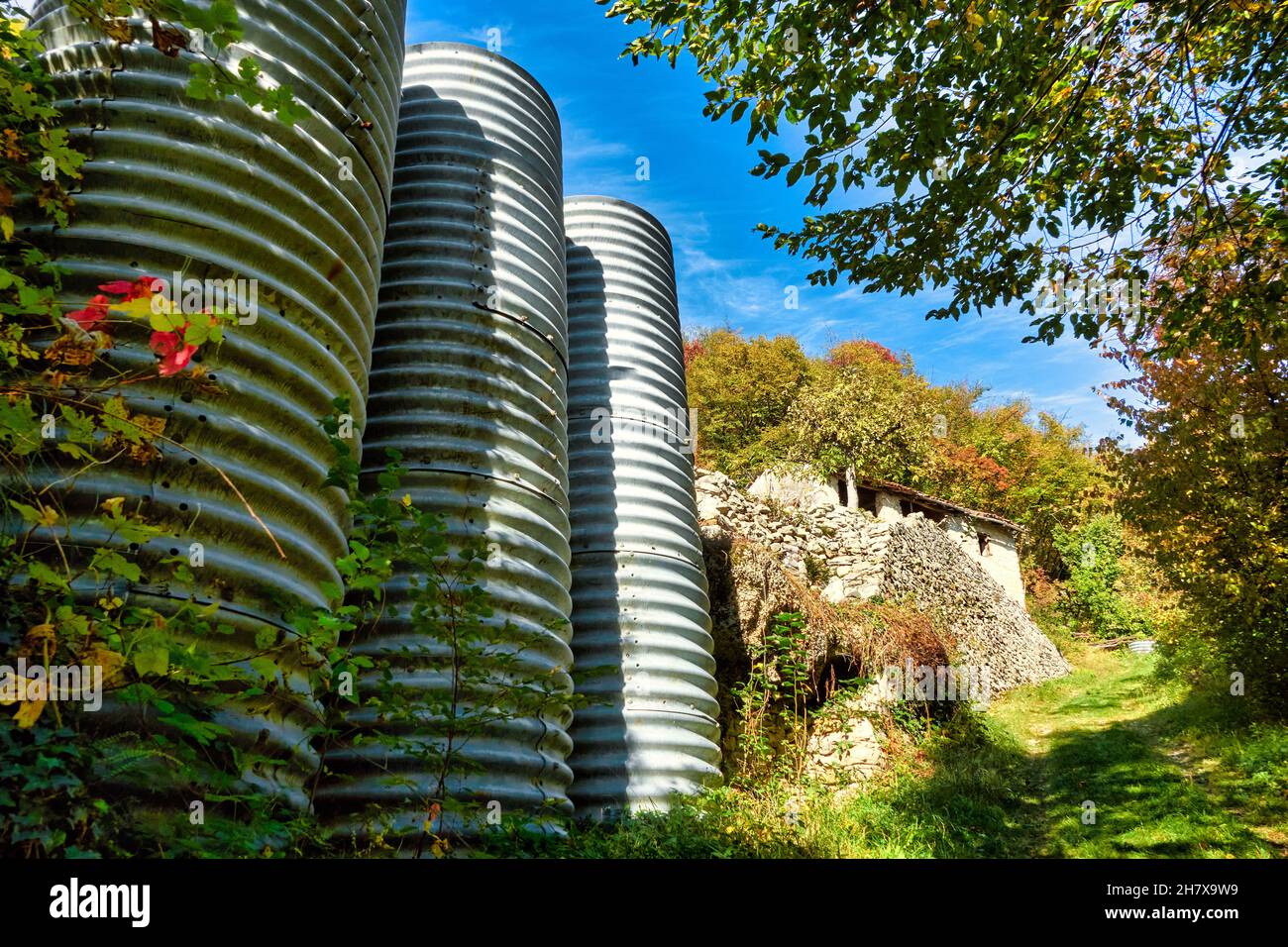 anti-collapse metal containment structure, on the side of a hill Stock ...