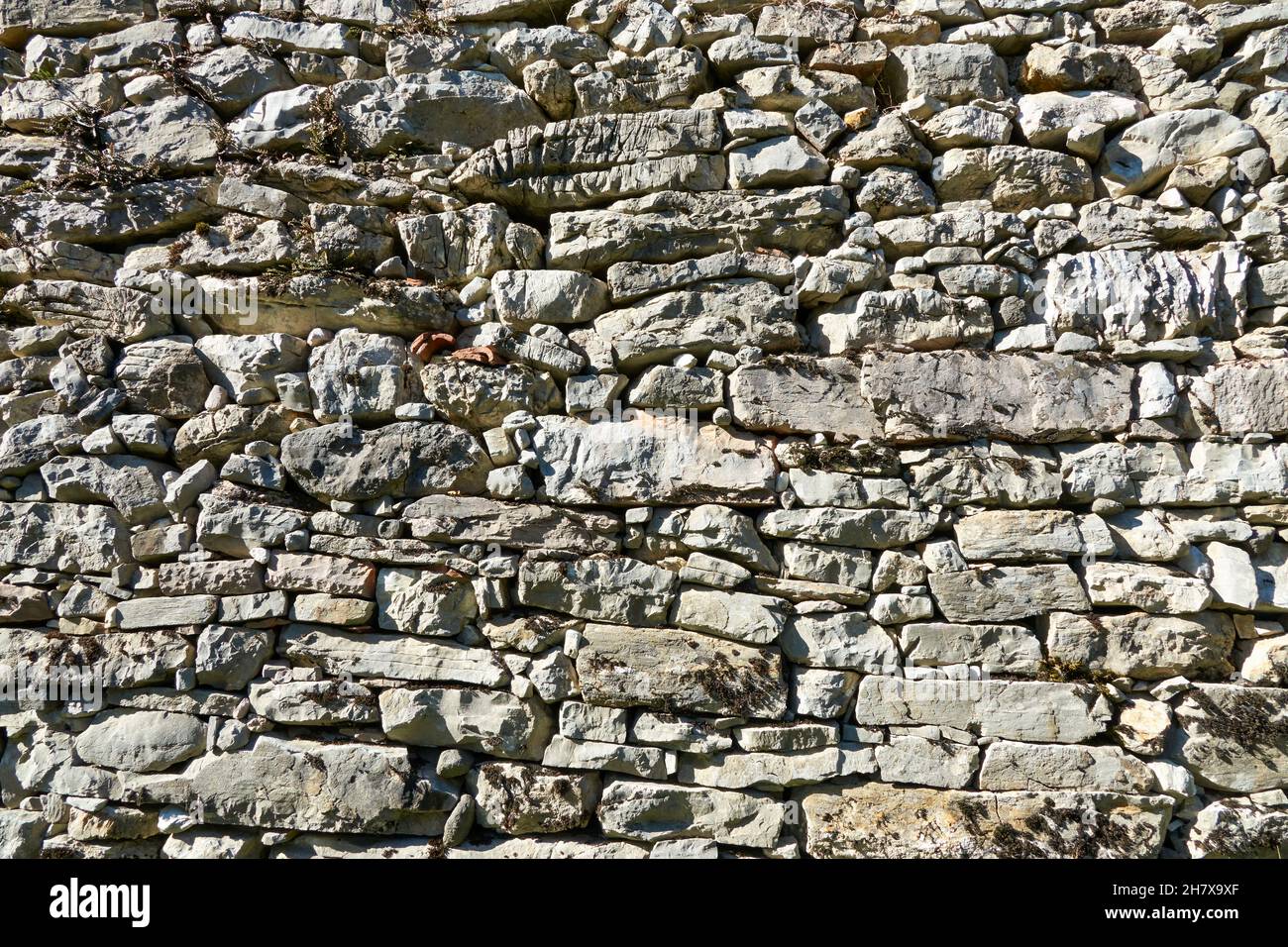 old stone wall made by hand Stock Photo - Alamy