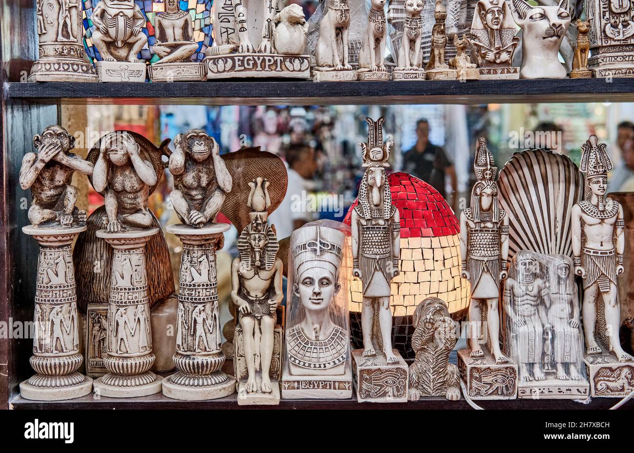Egyptian figurines depicting gods, pharaohs and others characters in ...