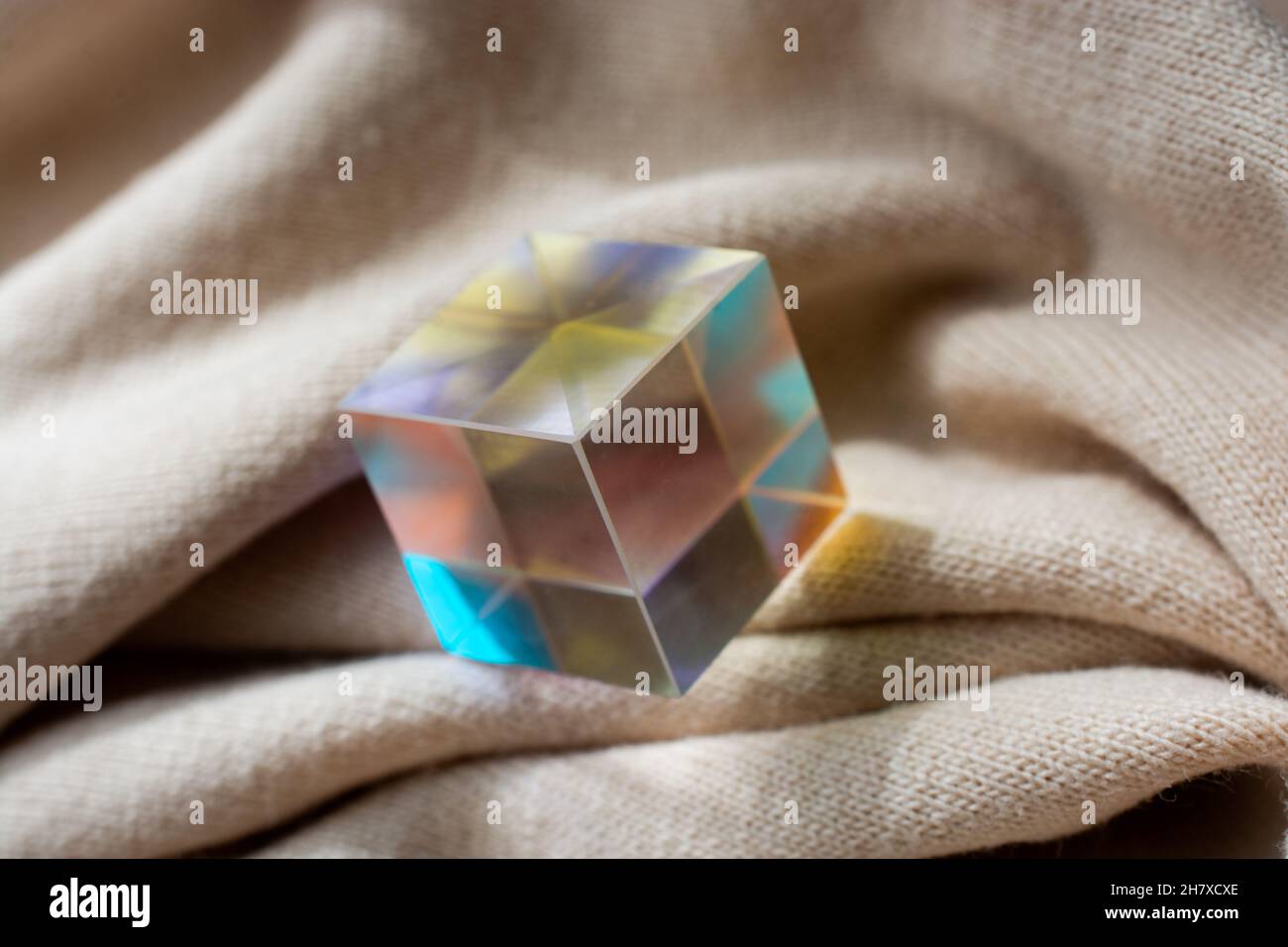 Luminous prism cubes refract light in different colors Stock Photo - Alamy