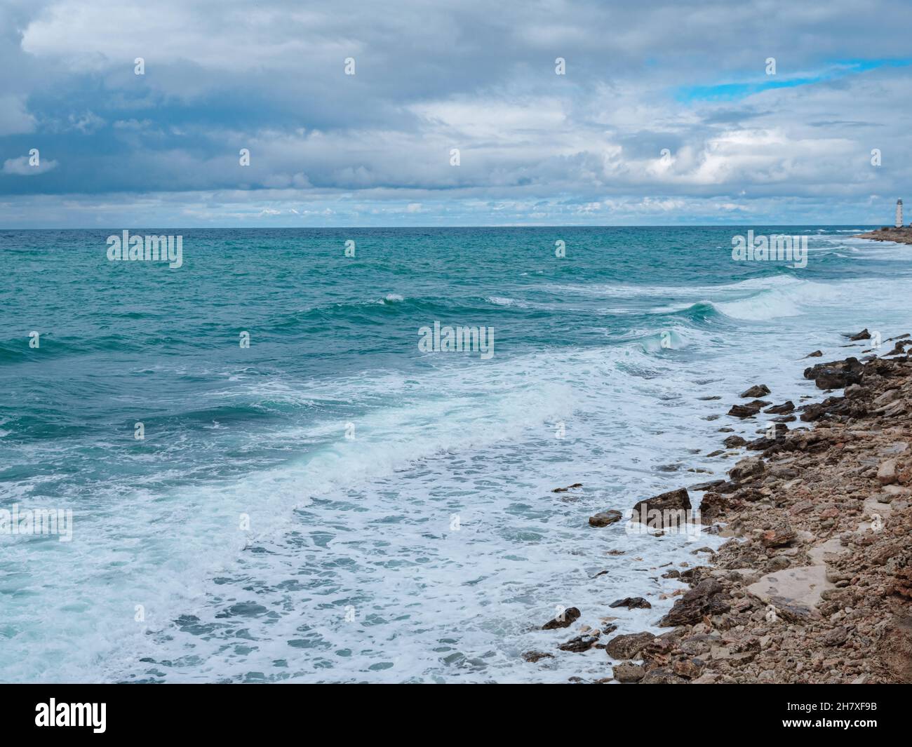 Beautiful view of ocean waves and a fantastic rocky shore, Sea patterns ...