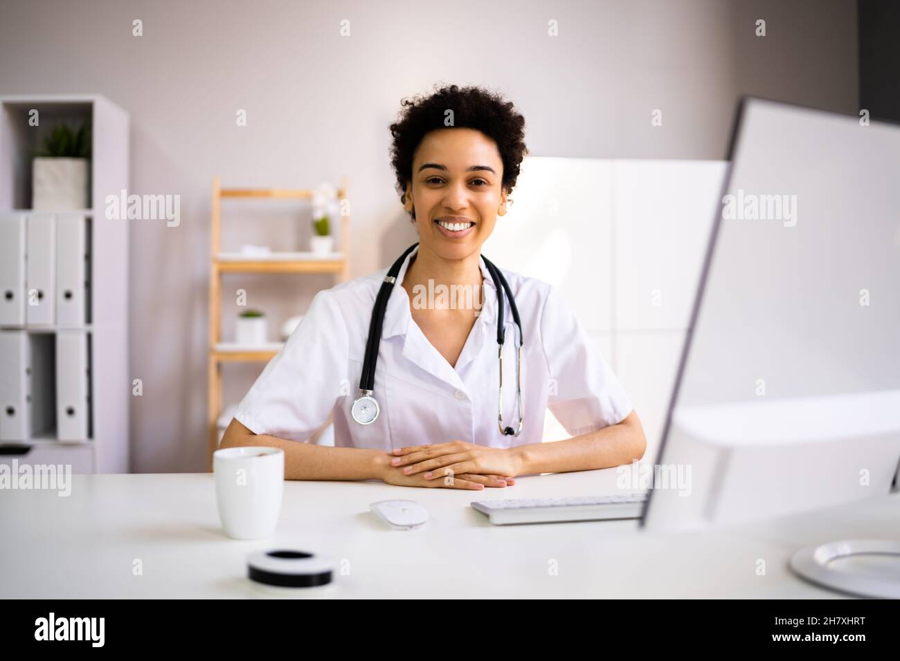Medical Doctor Using Computer In Hospital. African American Lady Stock ...